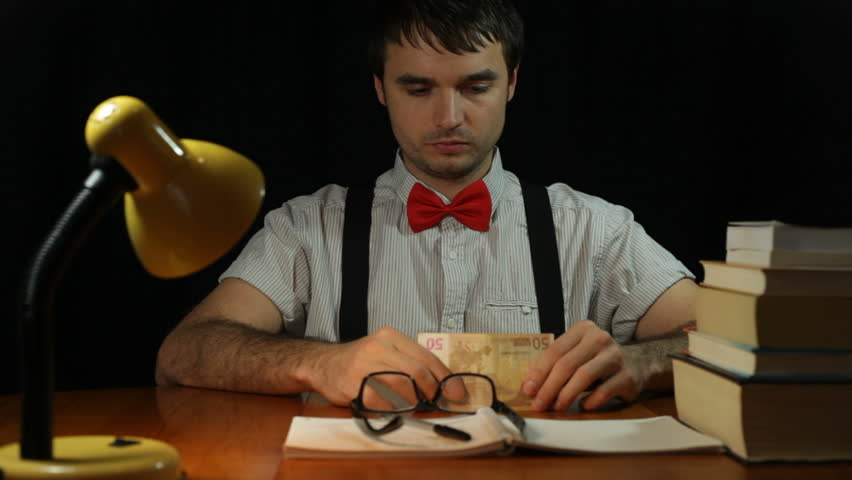 Serious Nerd Man Counting Euro Banknotes In Home Office At Night Stock Footage Video 3879587