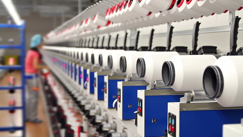 Textile Industry. Row Of Automated Machines For Yarn Manufacturing ...