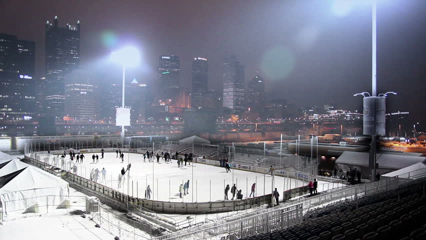 PITTSBURGH, PA - December, 2012: People Ice Skate At Penguins Pond, An ...