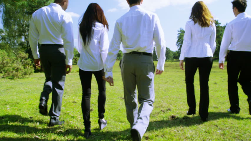 Business Team Walking Outside. Corporate Businessmen And Businesswomen ...