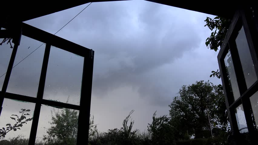 Establishing Shot Or Concept - View Of Stormy Weather Raining Through ...