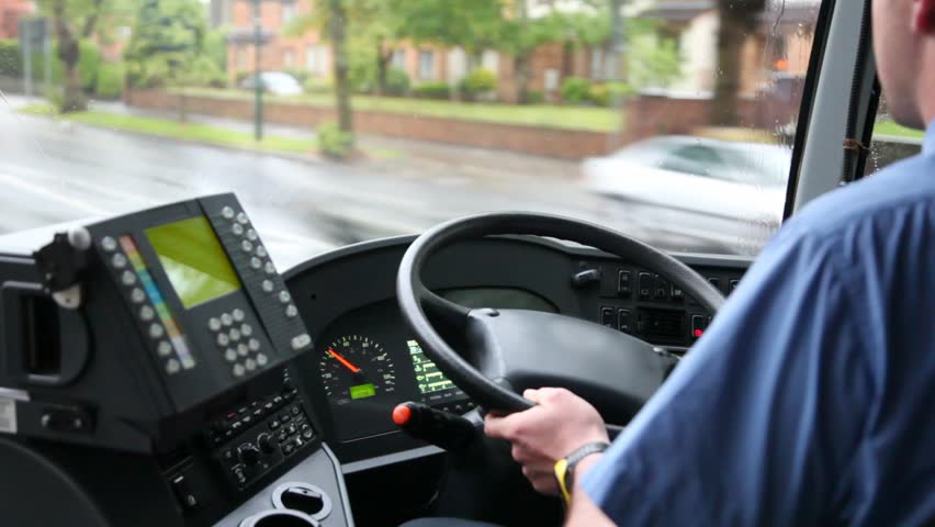 Bus Driver Is Driving A Bus. View Of Steering Wheel, Hands And Motorway ...